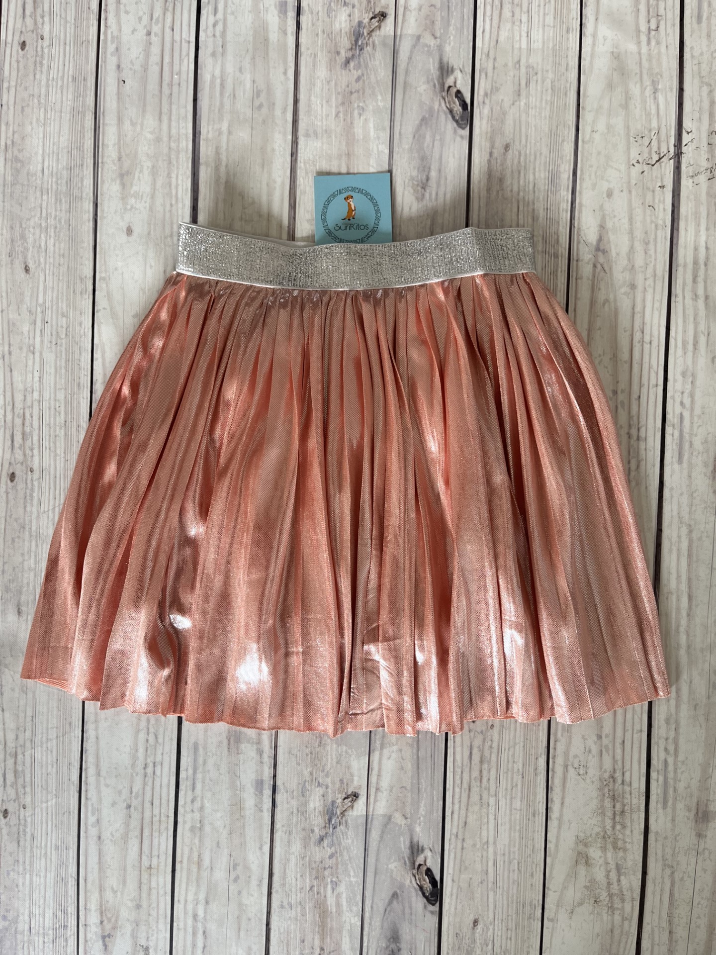 POLLERA METALIZADA ROSA. LINEA IMPORTADA – Surikitos