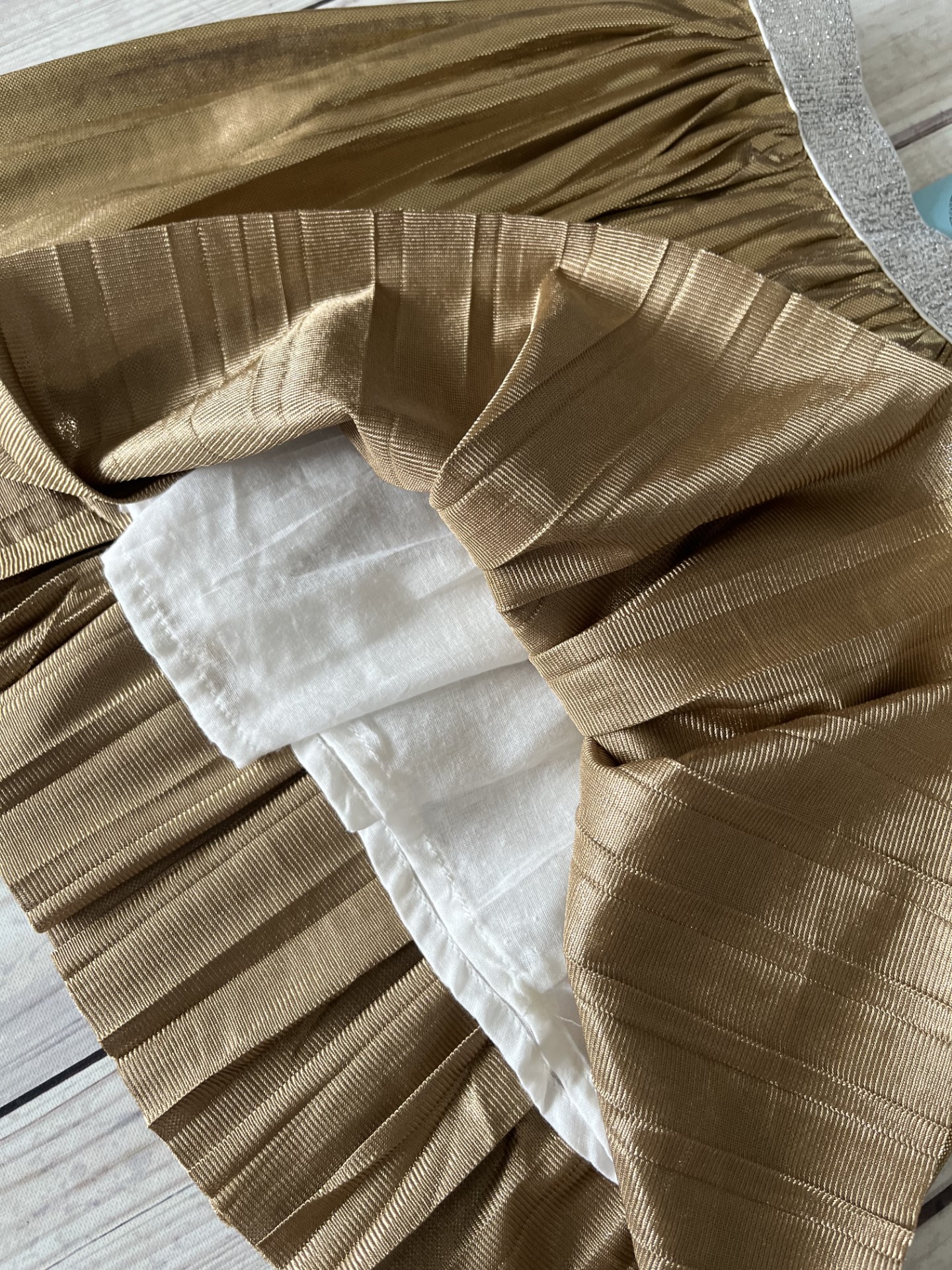 POLLERA METALIZADA DORADA . LINEA IMPORTADA – Surikitos