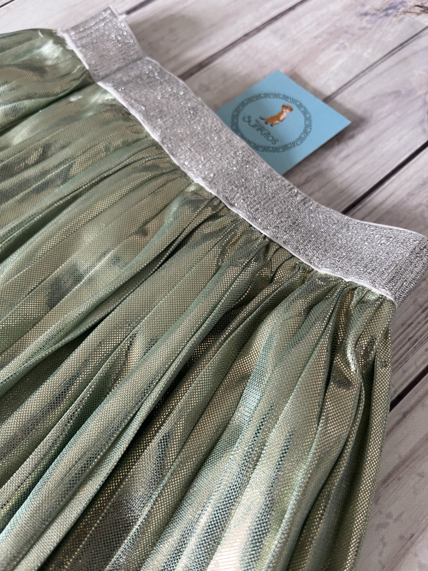 POLLERA METALIZADA VERDE . LINEA IMPORTADA – Surikitos